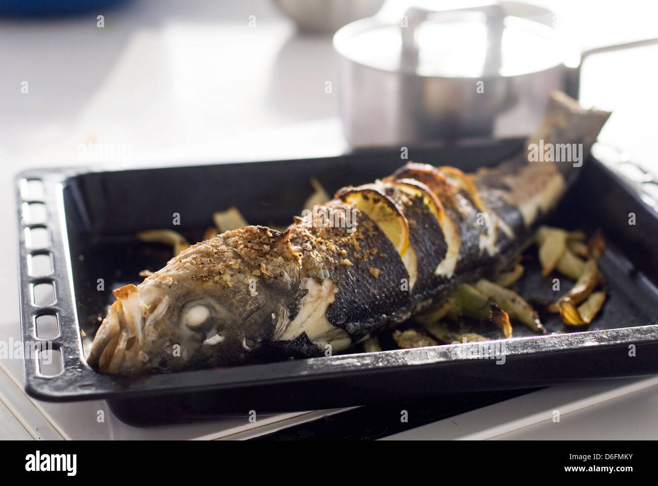Whole roasted fish hi-res stock photography and images - Alamy