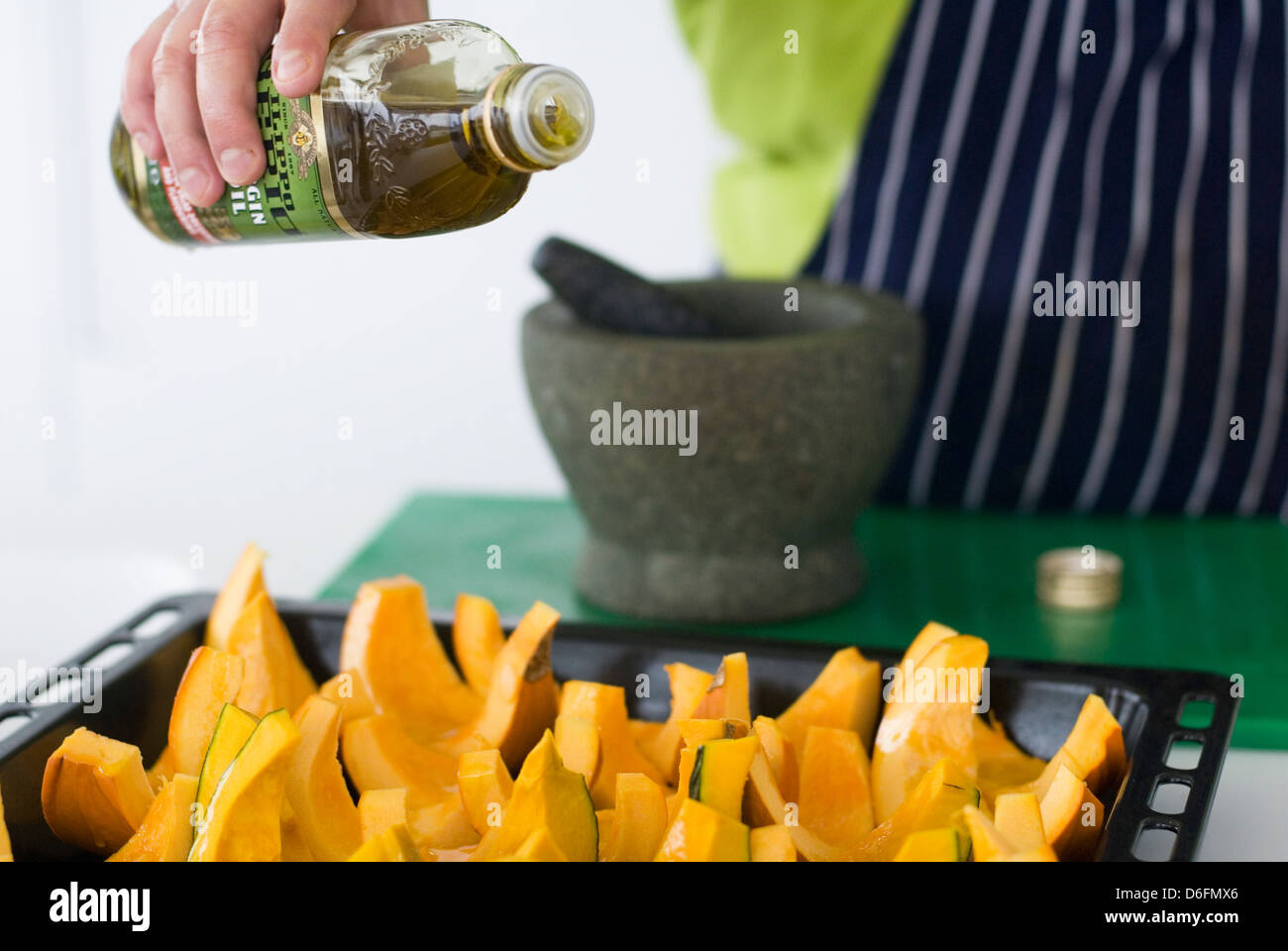 Preparing roast squash Stock Photo - Alamy