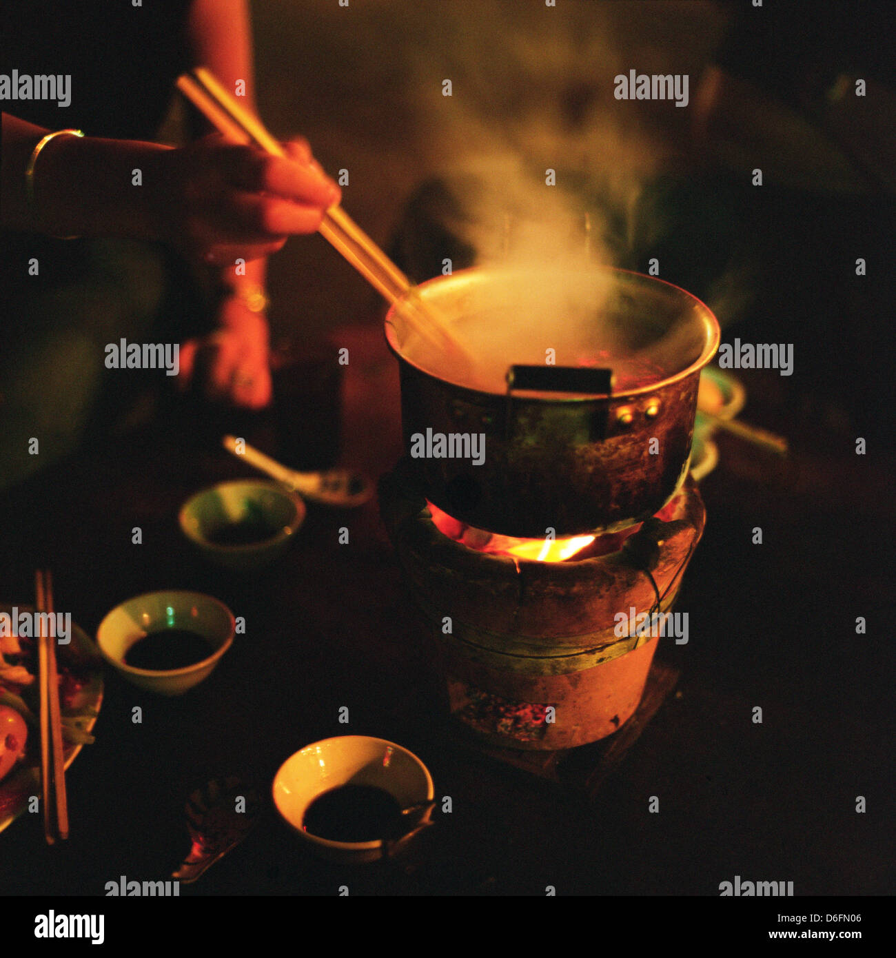 Cooking pot in China Stock Photo - Alamy