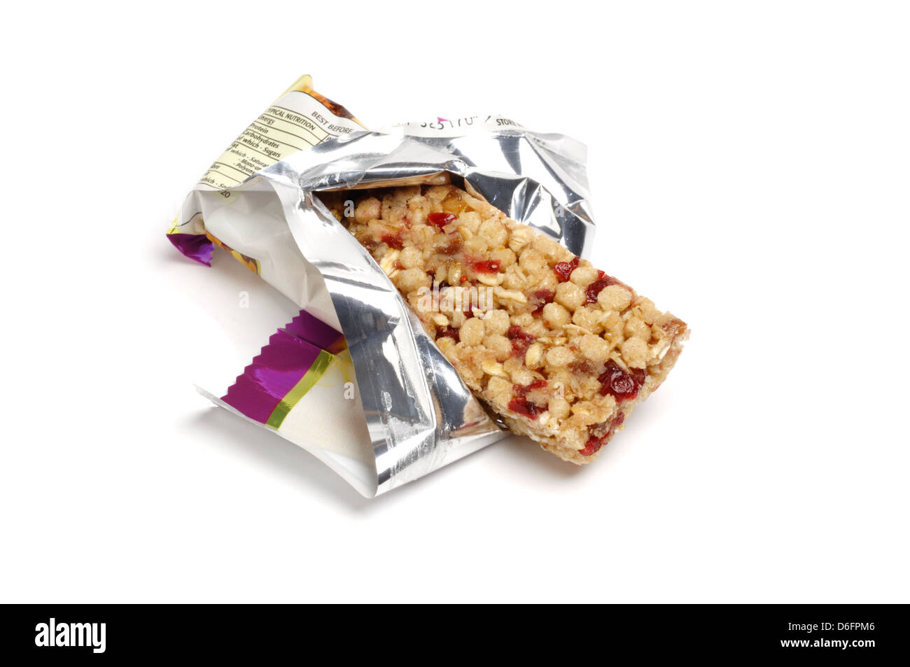 Fruit and cereal healthy snack bar in wrapper on white background Stock ...