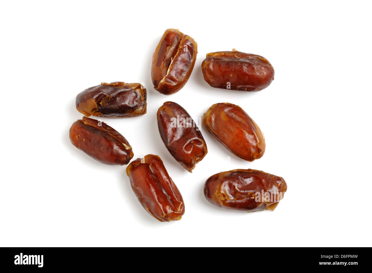 Dried stoned dates on white background Stock Photo - Alamy