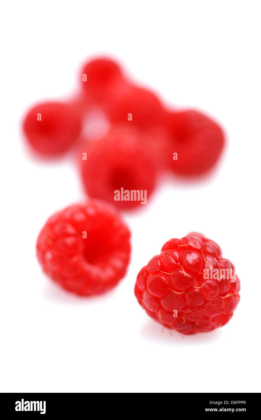 Raspberries close up on white background Stock Photo - Alamy