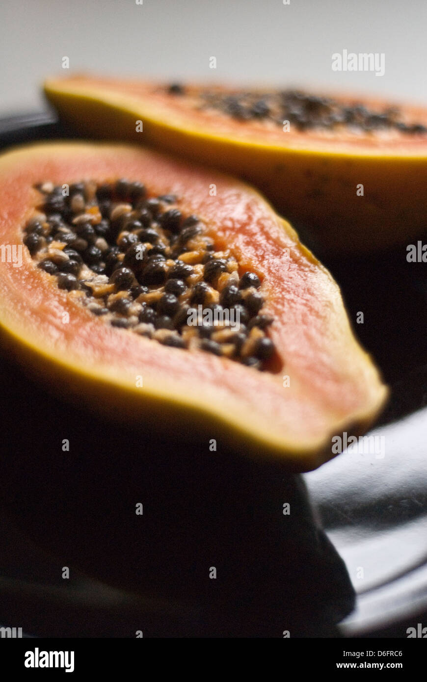 Raw papayas hi-res stock photography and images - Alamy