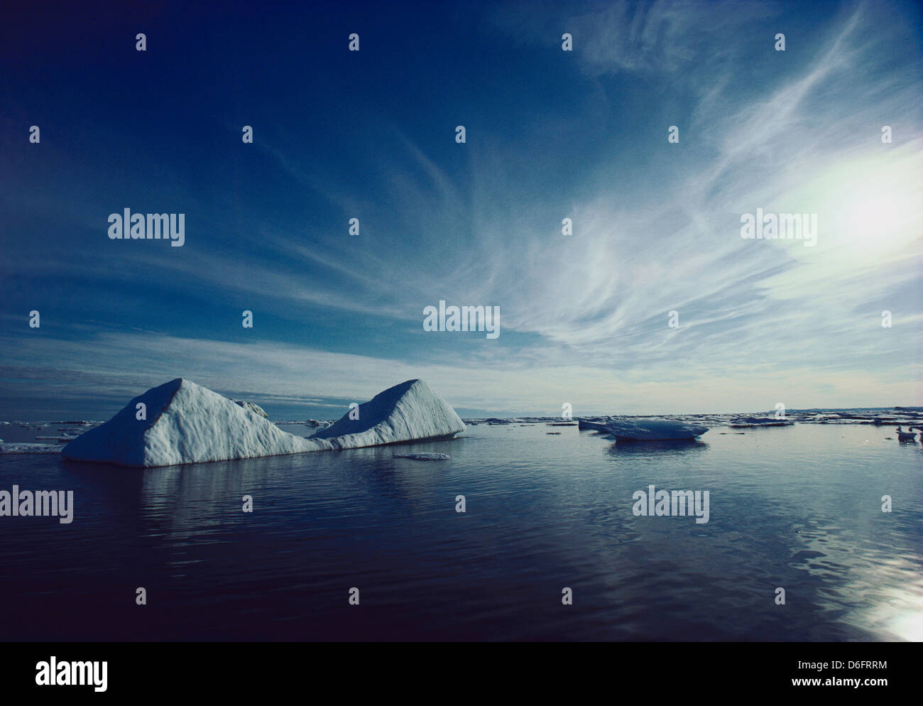 Double triangular shaped iceberg floating in Frobisher Bay, Cumberland ...