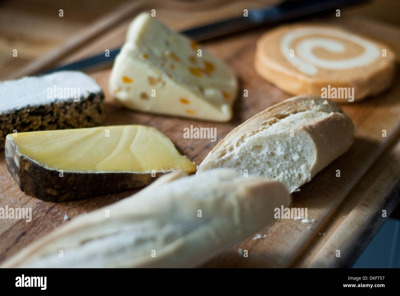 Selection of Cheeses and fresh French Bread Stock Photo - Alamy