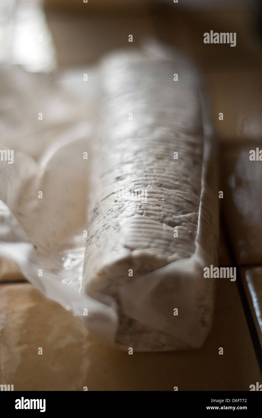 Roll of Goats Cheese Stock Photo - Alamy