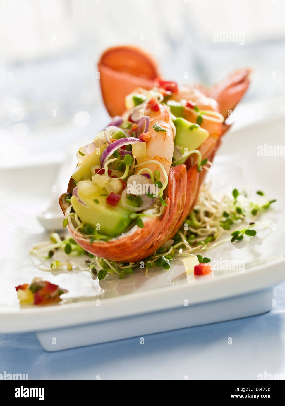 Avocado, seafood, alfalfa sprouts, evoo and three color tomato brunoise ...