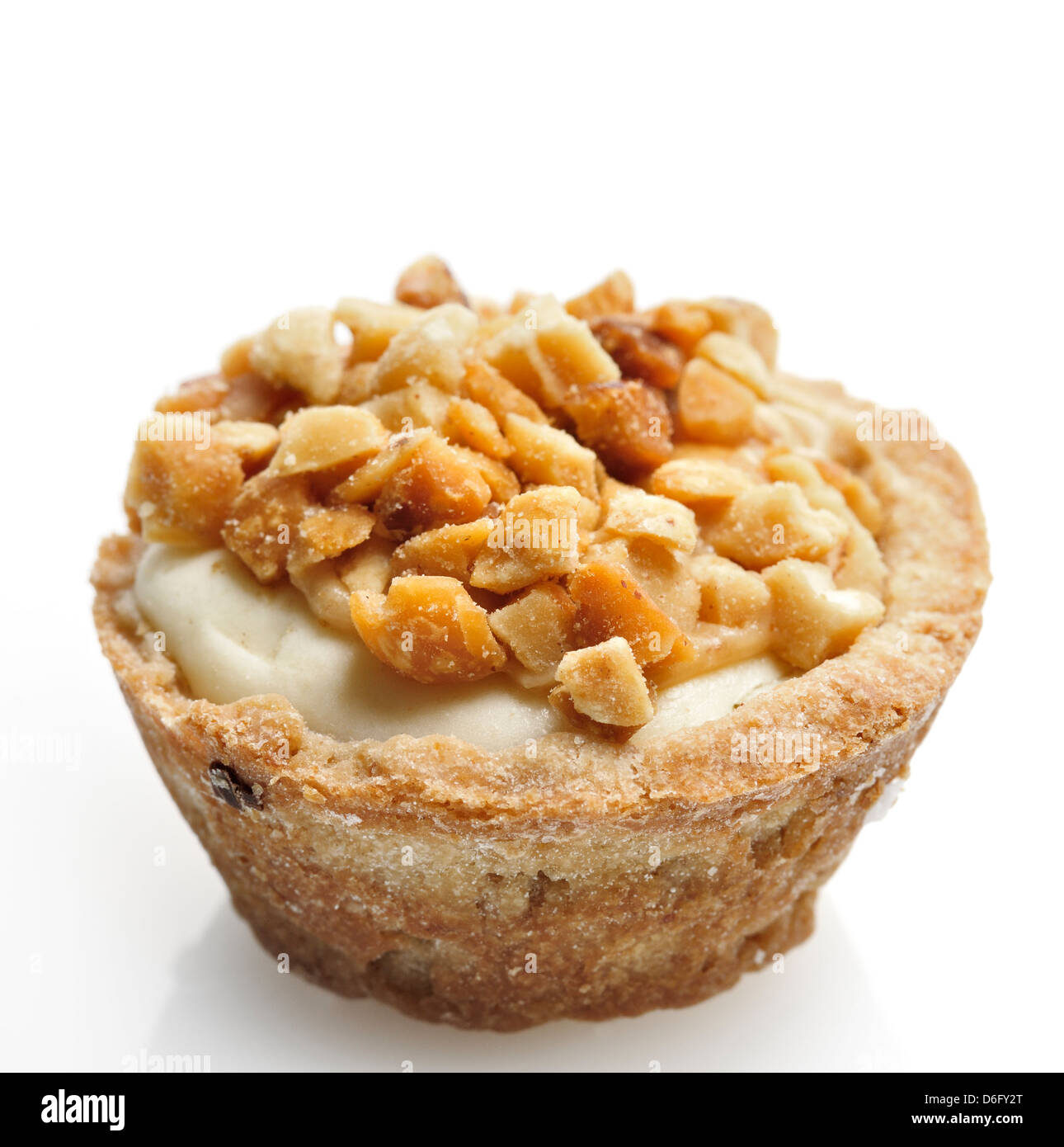 Small Round Cheesecakes With Peanuts Stock Photo - Alamy