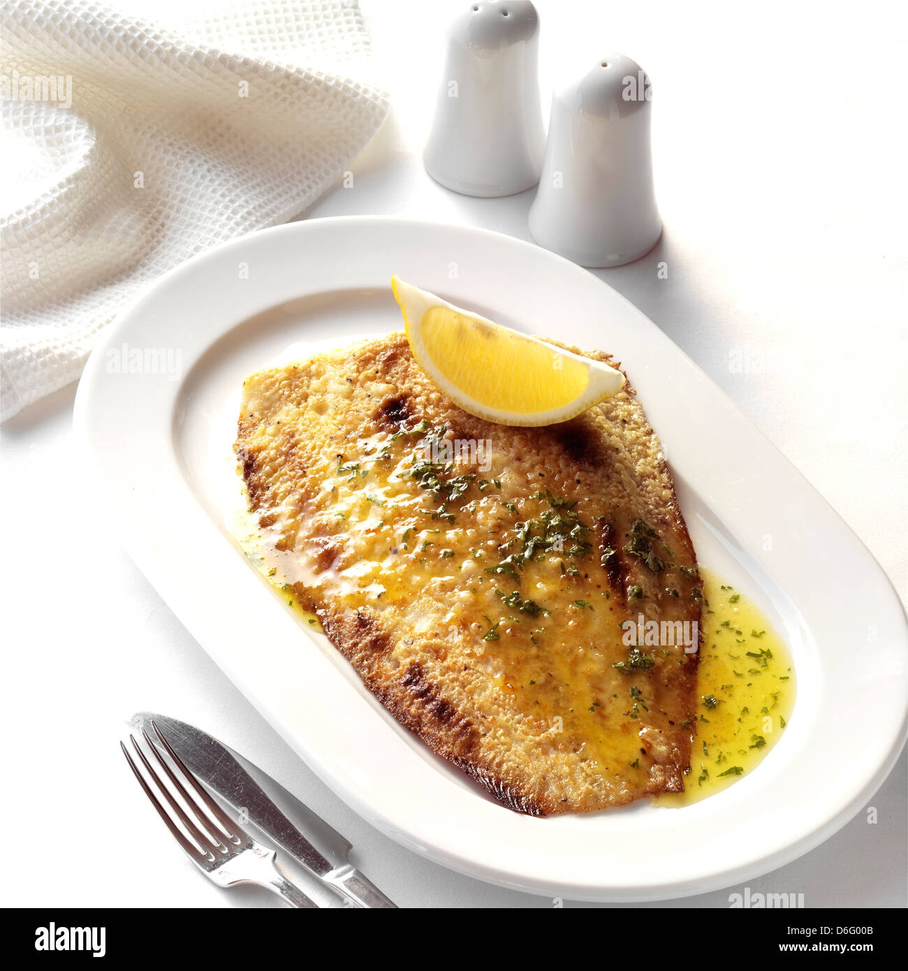 Fish with lemon slice Stock Photo - Alamy