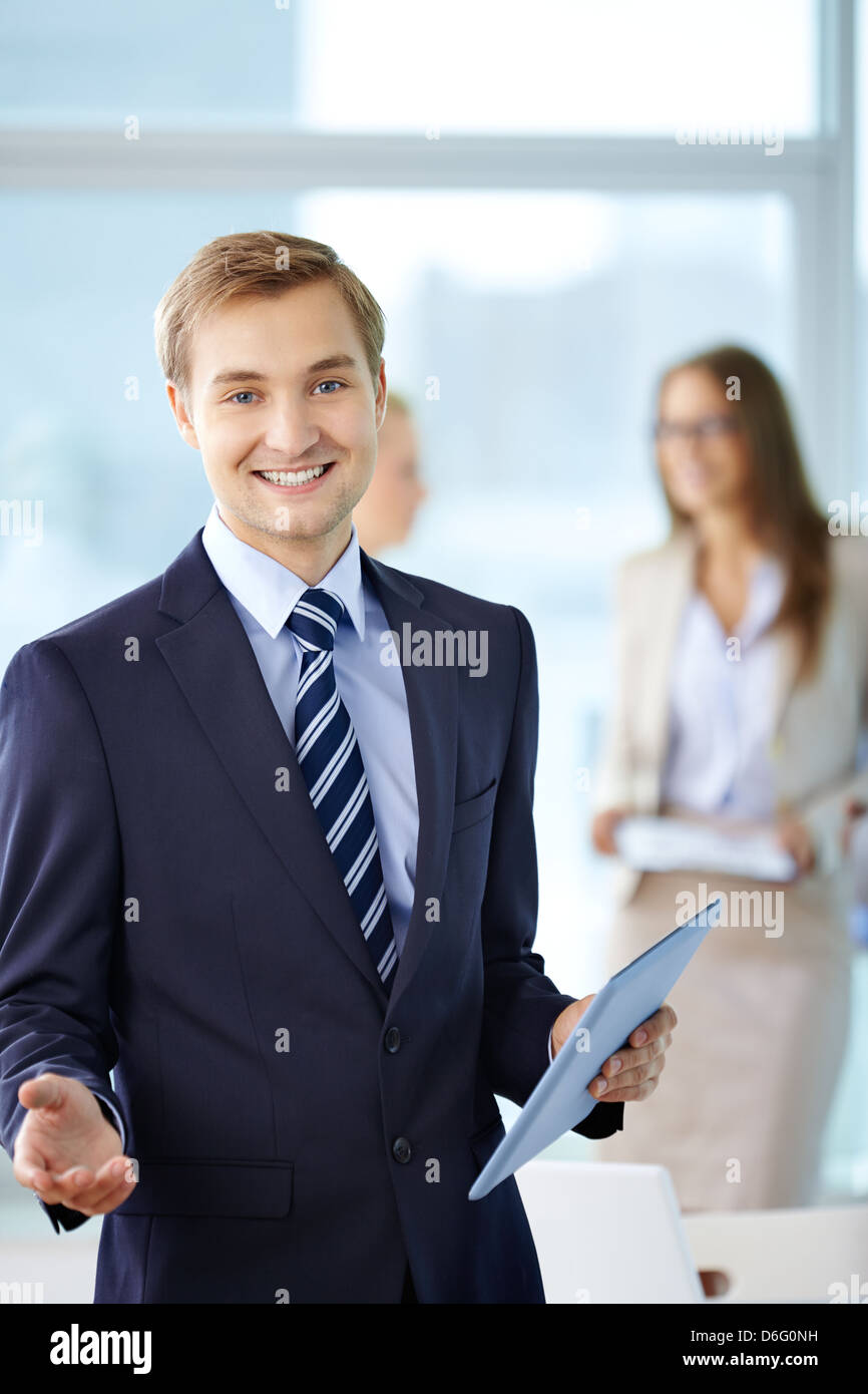 Portrait of cheerful boss with touchpad looking at camera Stock Photo ...