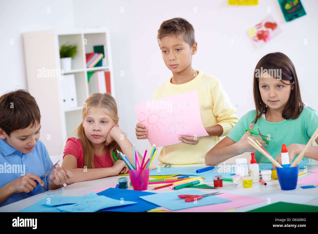 Little friends sitting in classroom at lesson Stock Photo - Alamy