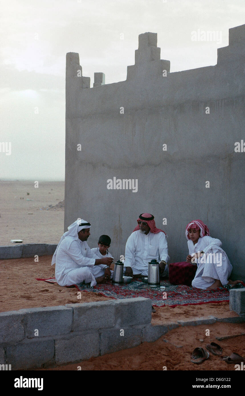 Riyadh Saudi Arabia -- Saudis relax in the sand outside their rest ...