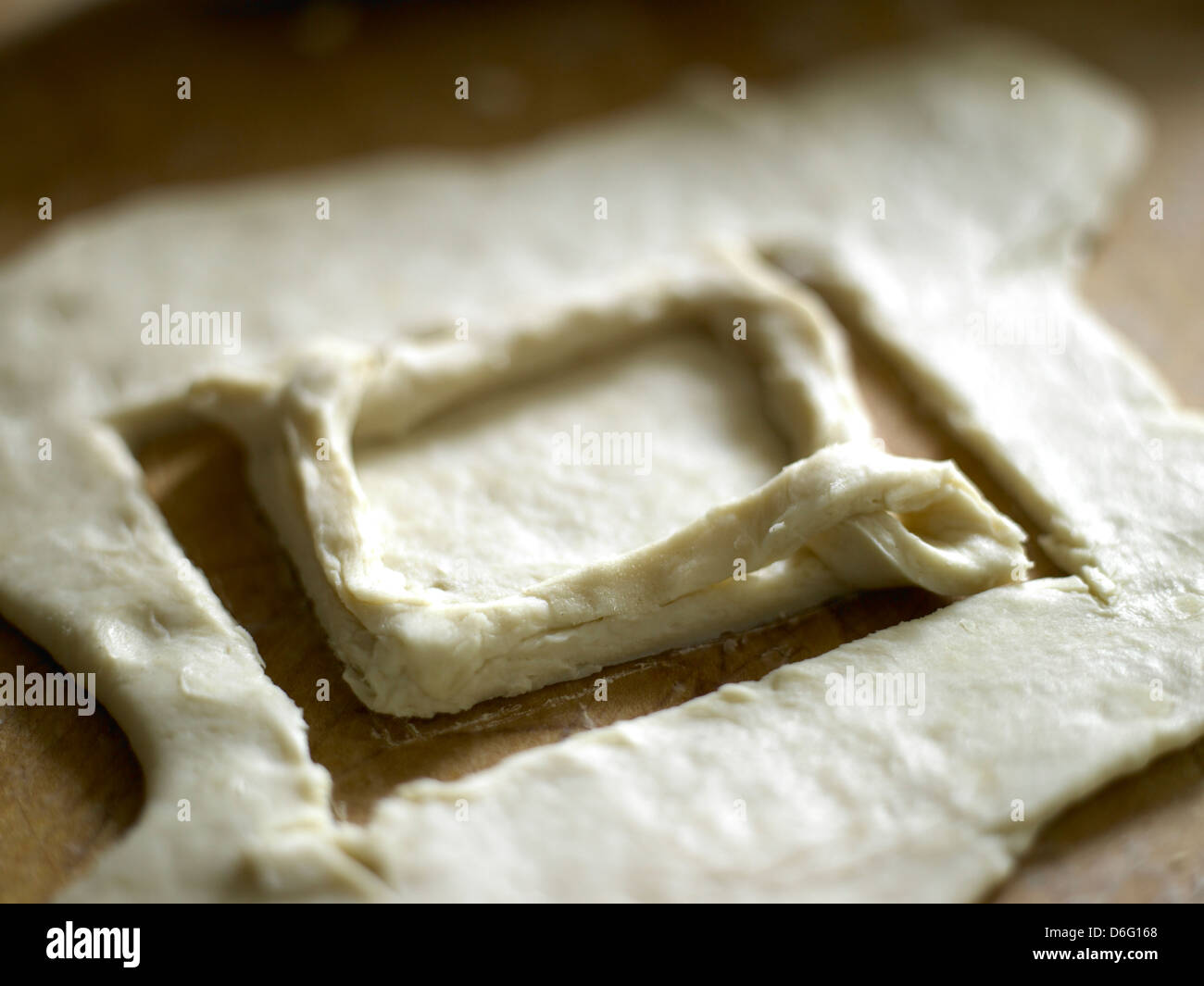 cutting pastry squares - with recipe Stock Photo - Alamy