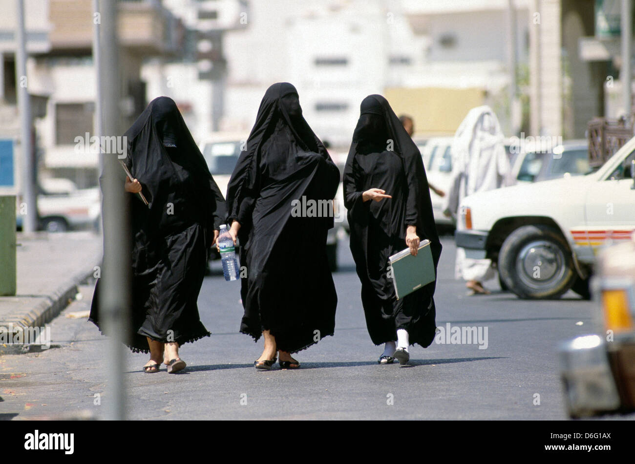 Three Saudi veiled women walking in Al Khobar, Eastern Province, Saudi ...