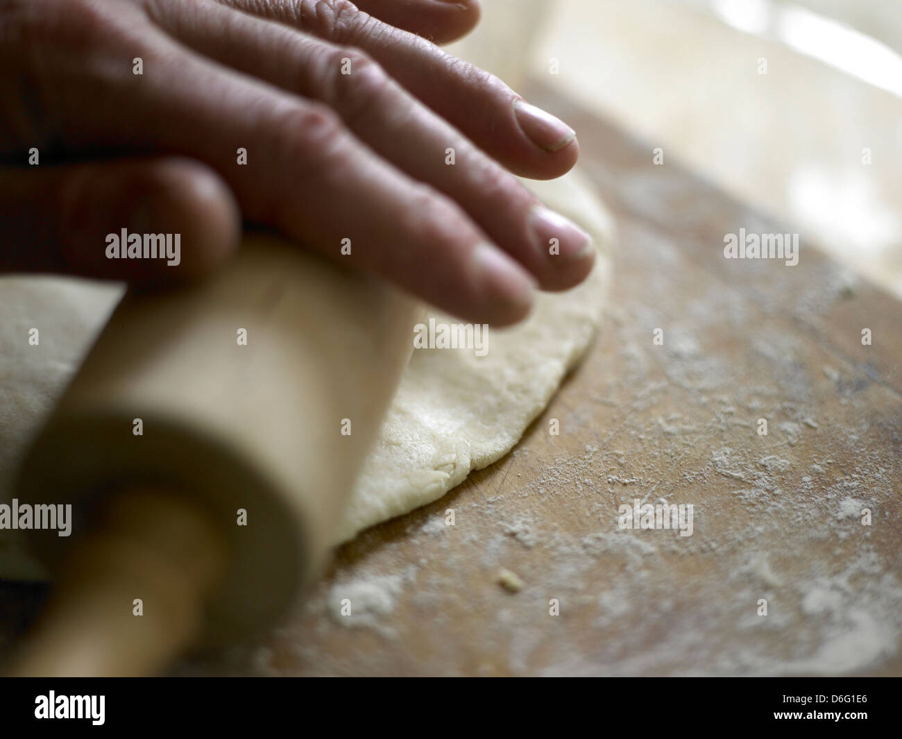 Rolling pastry dough Stock Photo - Alamy