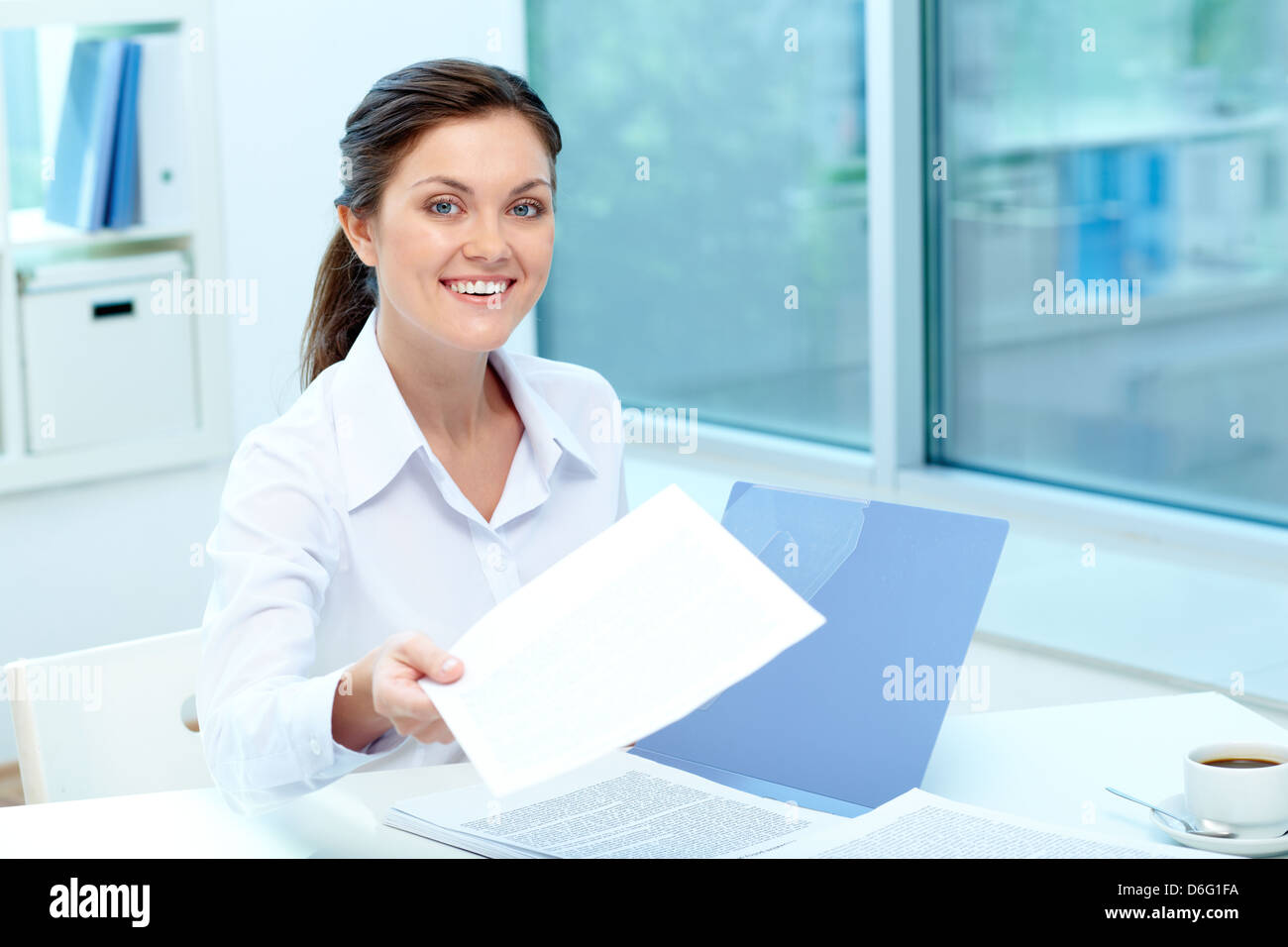 Portrait of happy employer giving test results to applicant Stock Photo ...