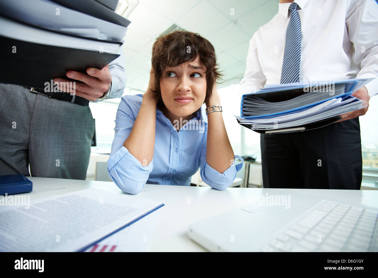 Office lady being scared because of too much paperwork to do Stock ...
