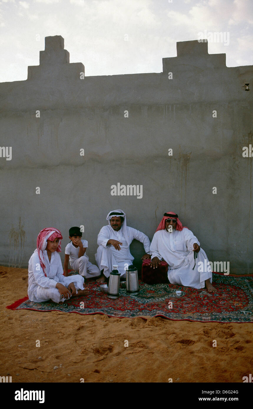 Riyadh Saudi Arabia -- Saudis relax in the sand outside their rest ...