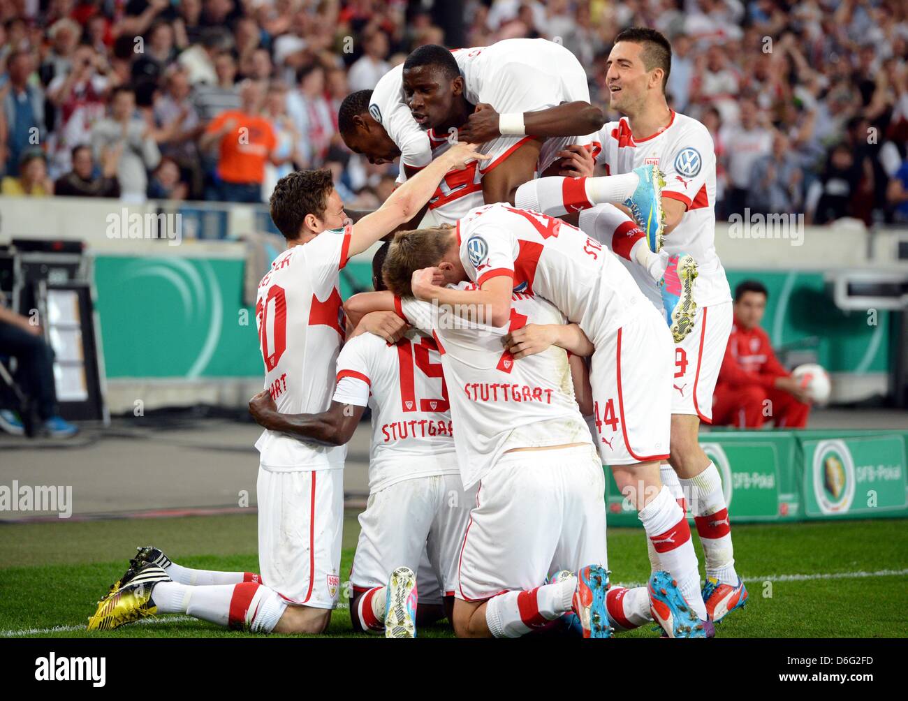 Stuttgart's players celebrate the 1-0 goal by Arthur Boka (bottom 2-L ...