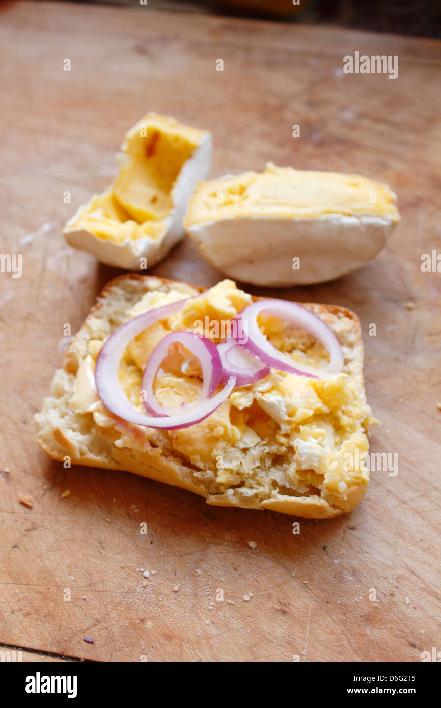 Cows milk soft cheese with Ciabatta bread and onion Stock Photo - Alamy