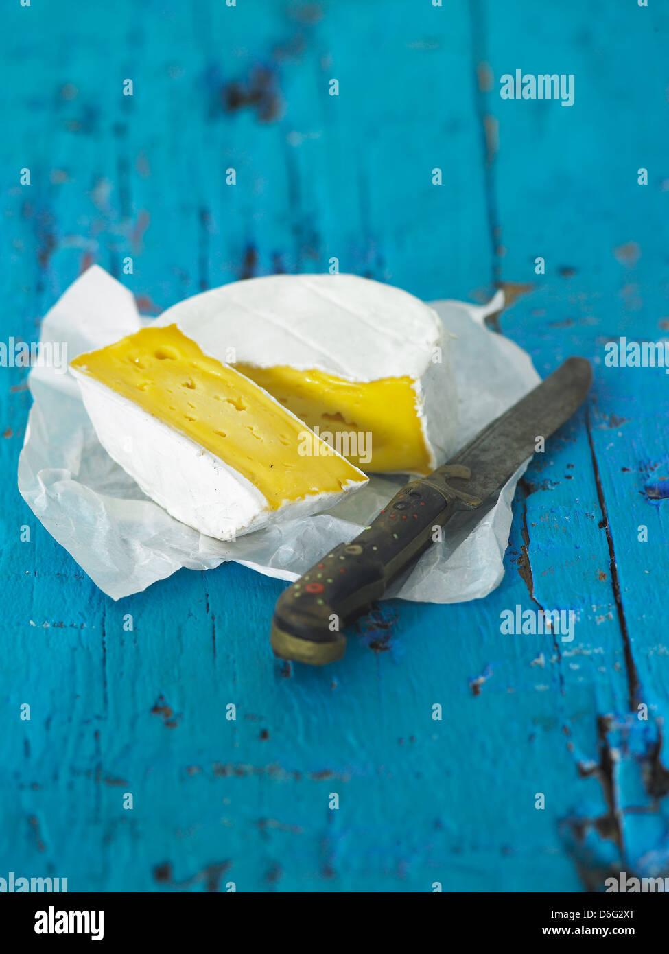 Cows Milk Soft Cheese and Knife Stock Photo - Alamy