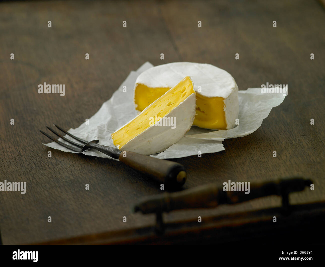 Soft Cheese Cows Milk and Old Fork Stock Photo - Alamy