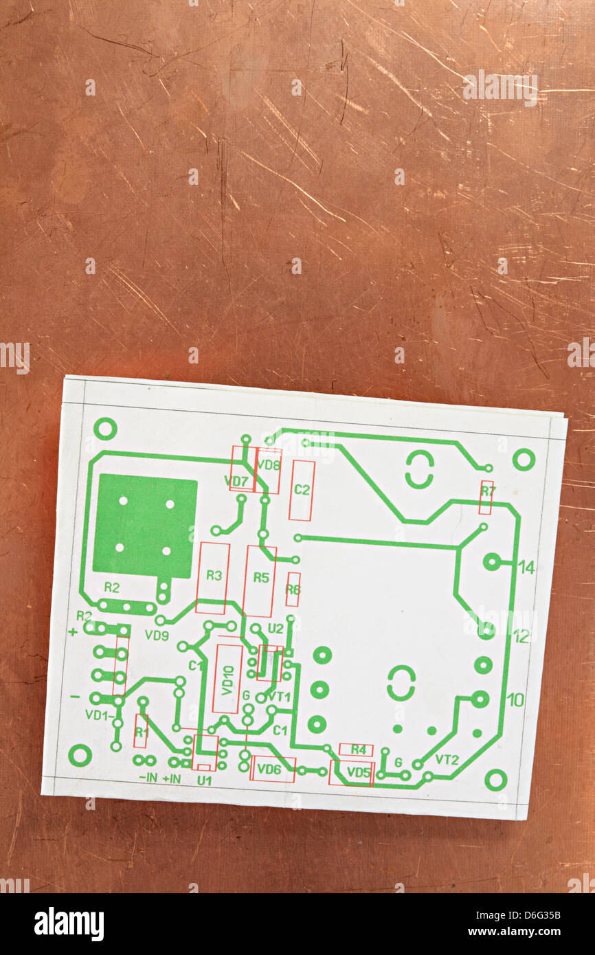 Drawing of electronic board on copper background from metal-clad glass ...