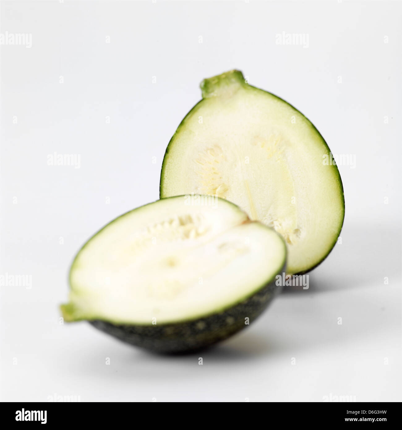 Halved Round Courgette - Zucchini Stock Photo - Alamy