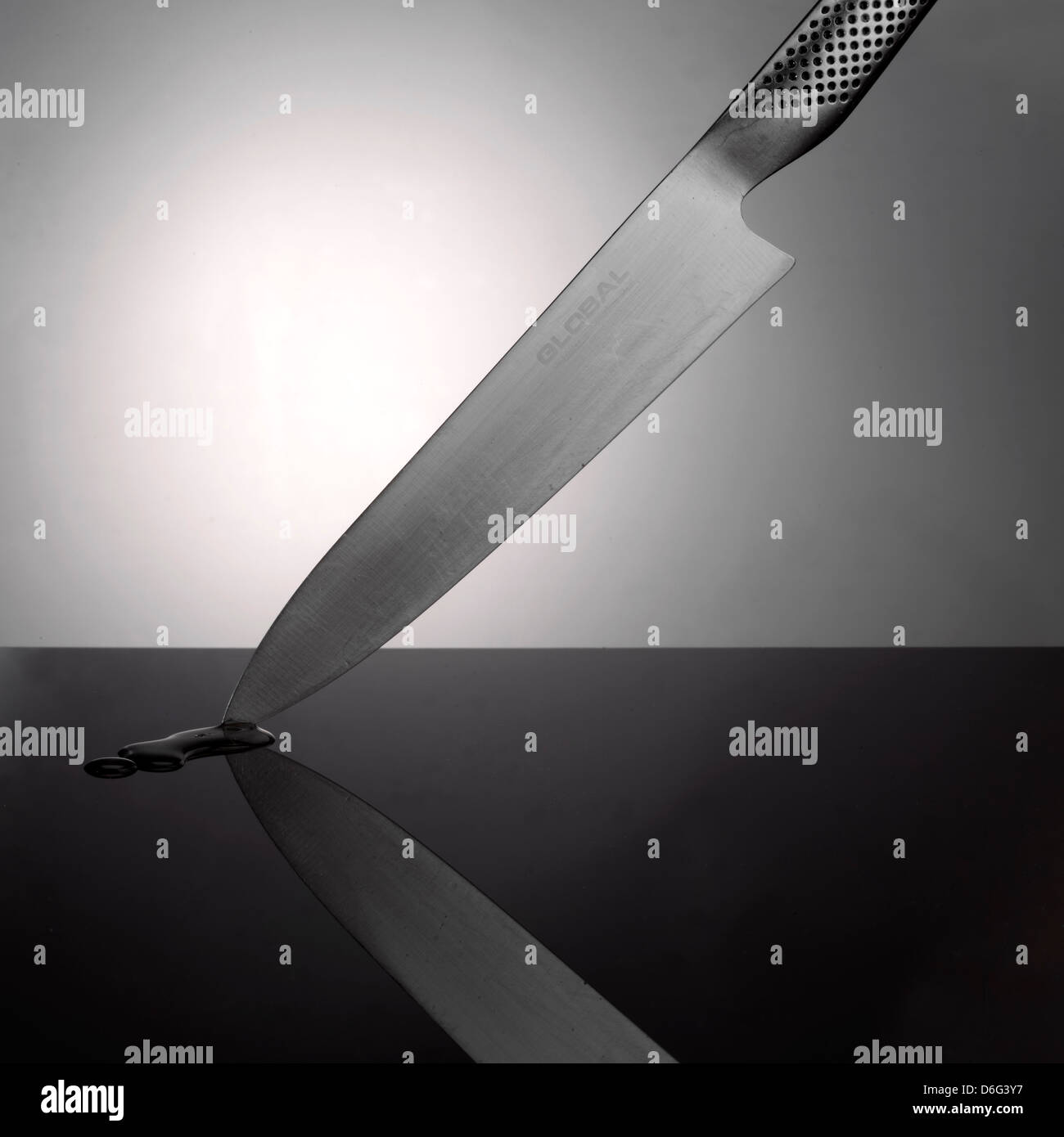 Dripping Kitchen Knife Stock Photo - Alamy