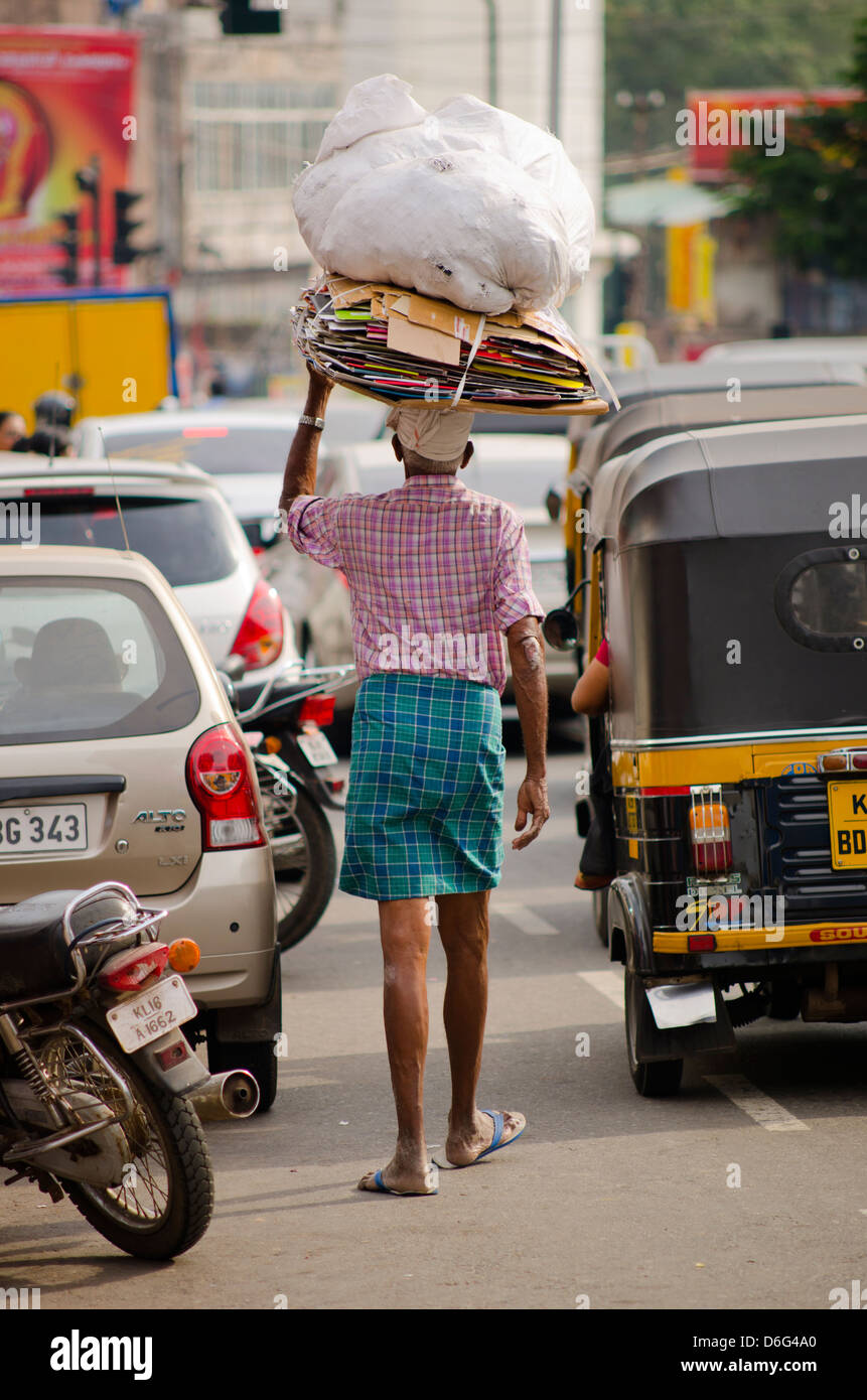 A man in a busy traffic, Trivandrum, India Stock Photo - Alamy