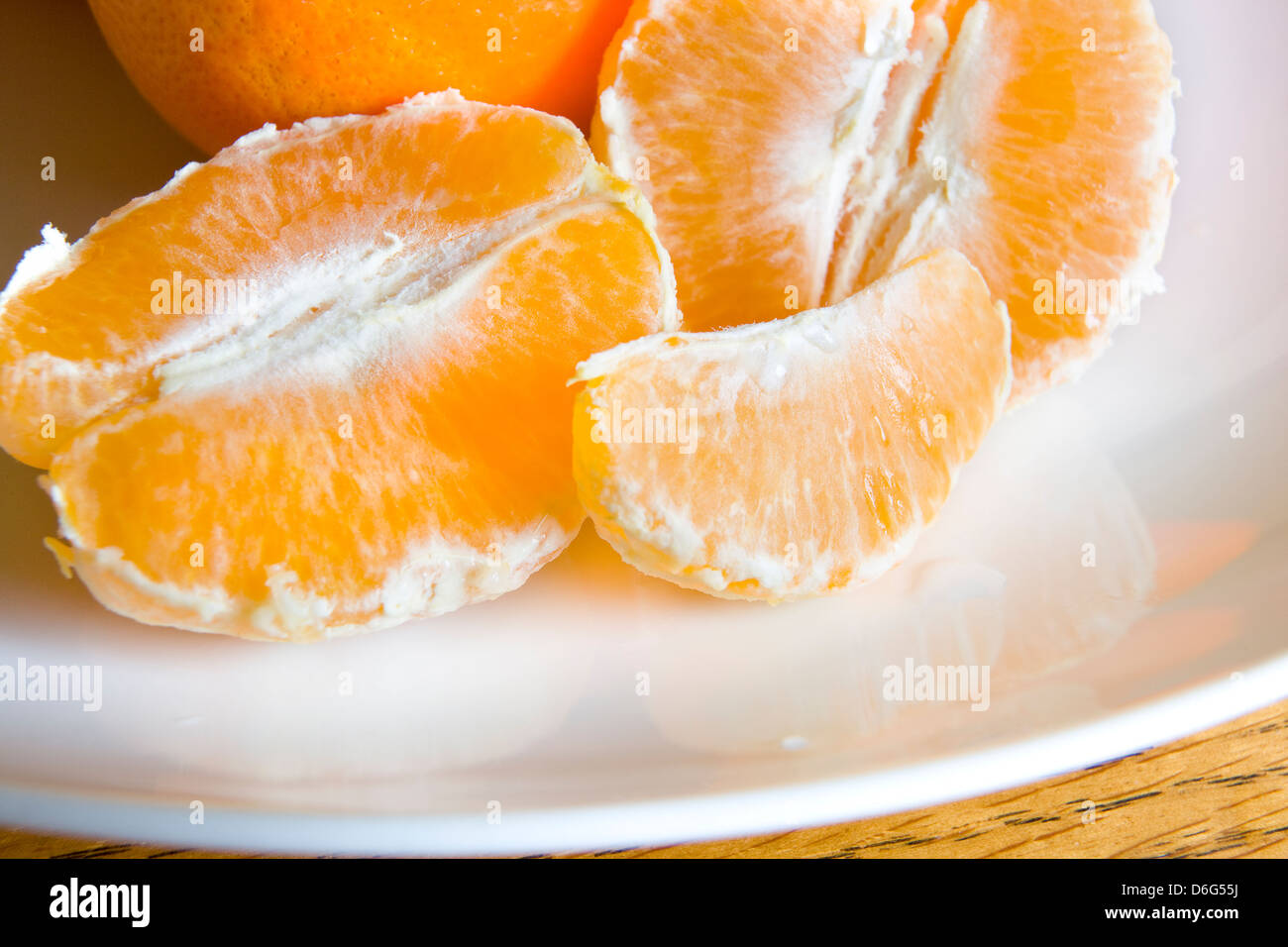 Fresh Minneola segments Stock Photo - Alamy