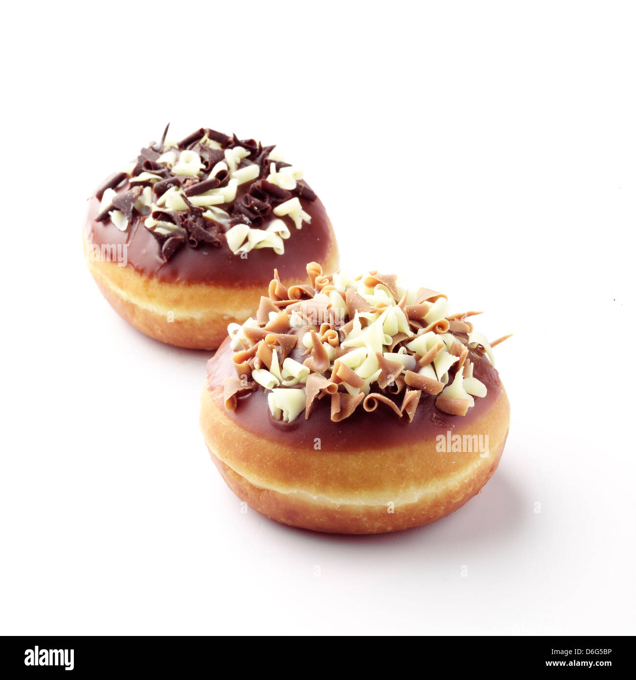 Two Doughnuts with Chocolate Flake toppings - cut out Stock Photo - Alamy