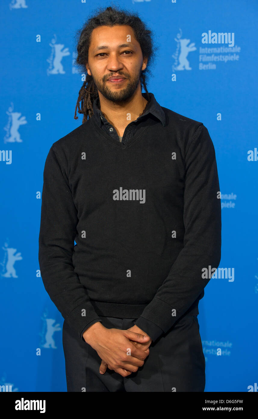 Director Alain Gomis is posing at a photocall for the movie "Tey ...