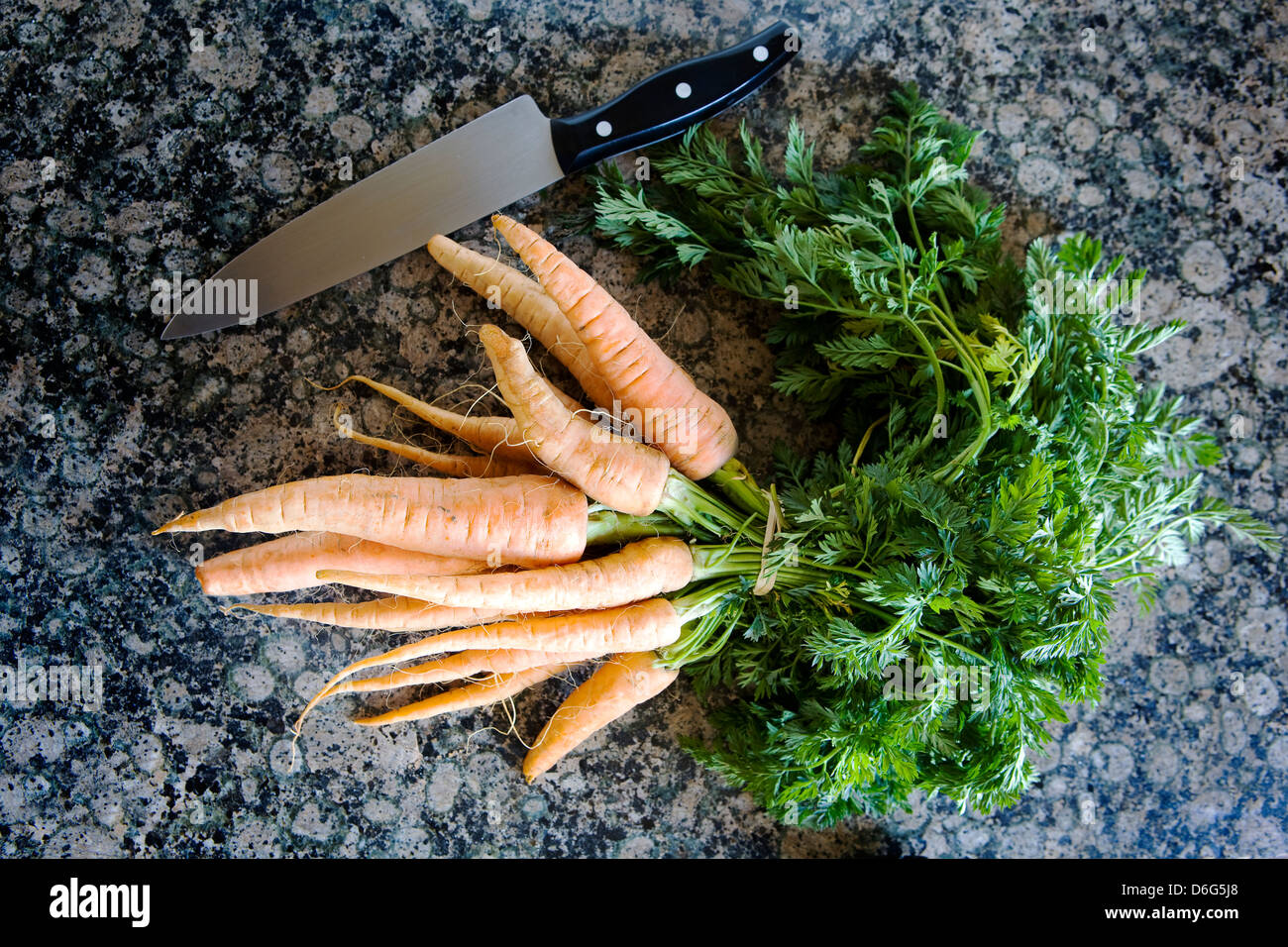 Orange carrots leaves knife hi-res stock photography and images - Alamy