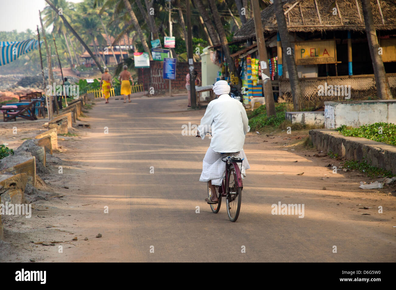 Indian man riding bicycle hi-res stock photography and images - Alamy