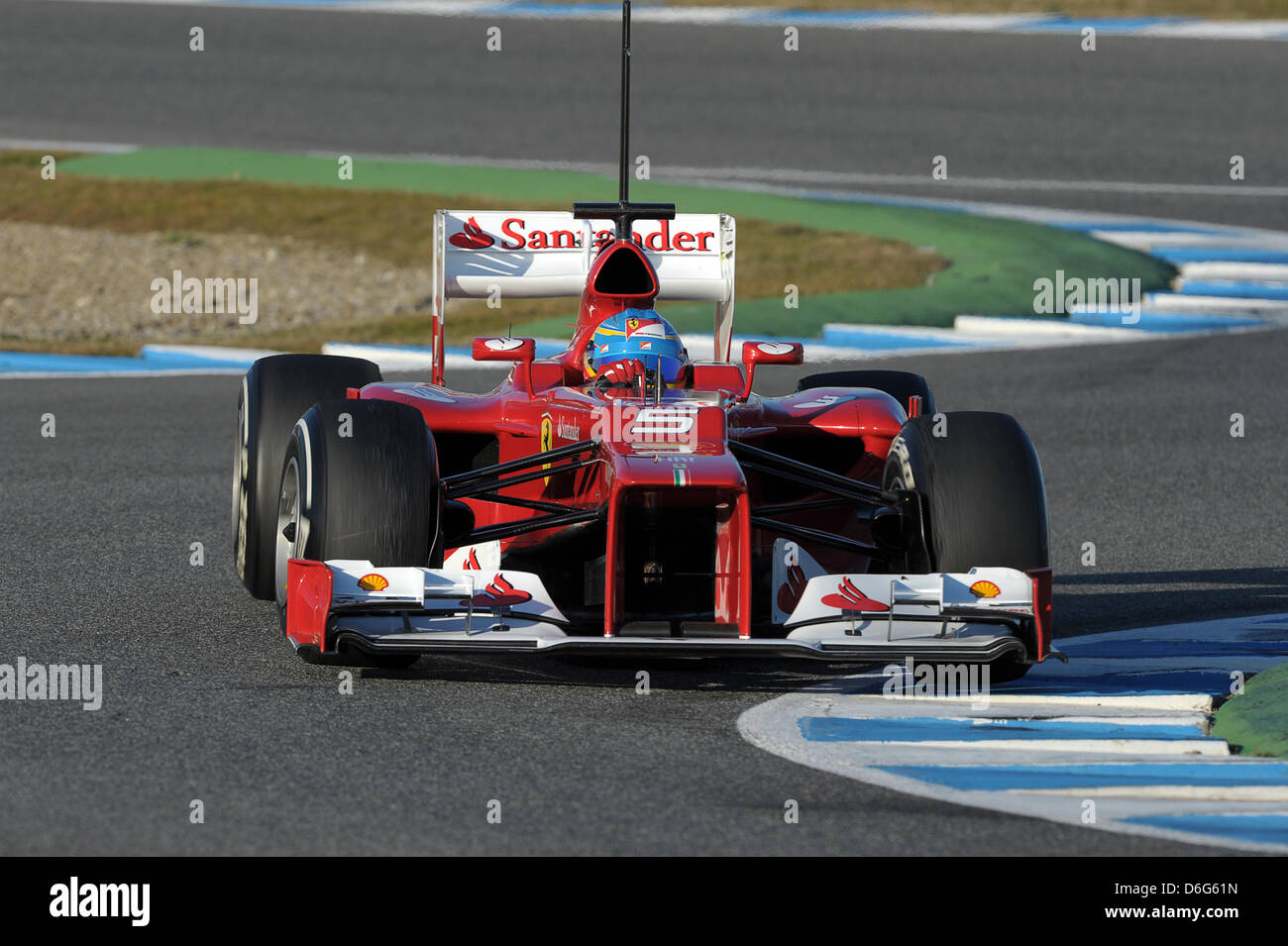 Spanish Formula One driver Fernando Alonso of Ferrari steers his new ...
