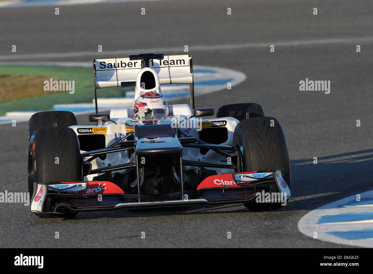 Japanese Formula One driver Kamui Kobayashi of Sauber steers his new ...
