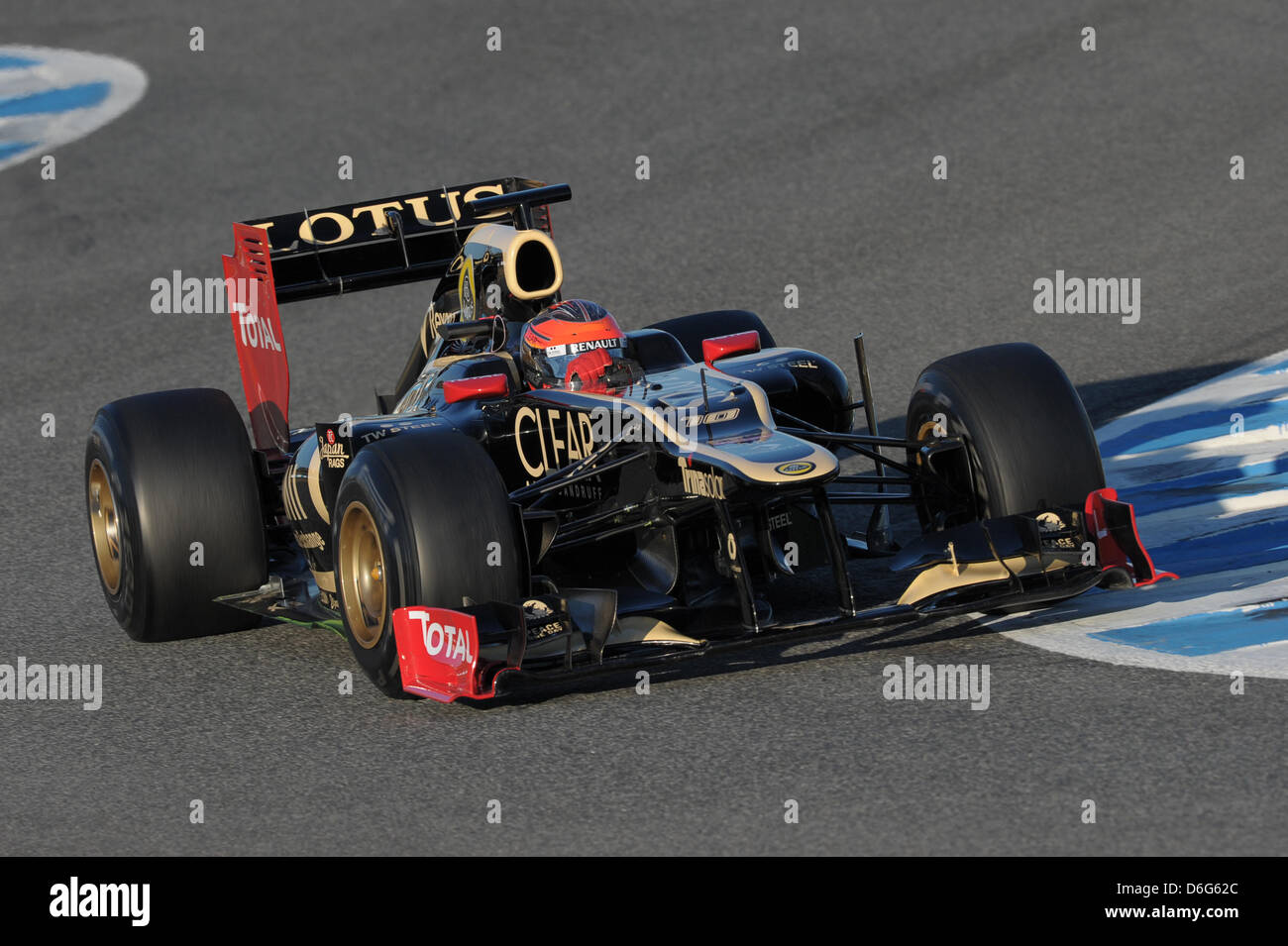 French Formula One driver Romain Grosjean of Lotus steers his new E20 ...