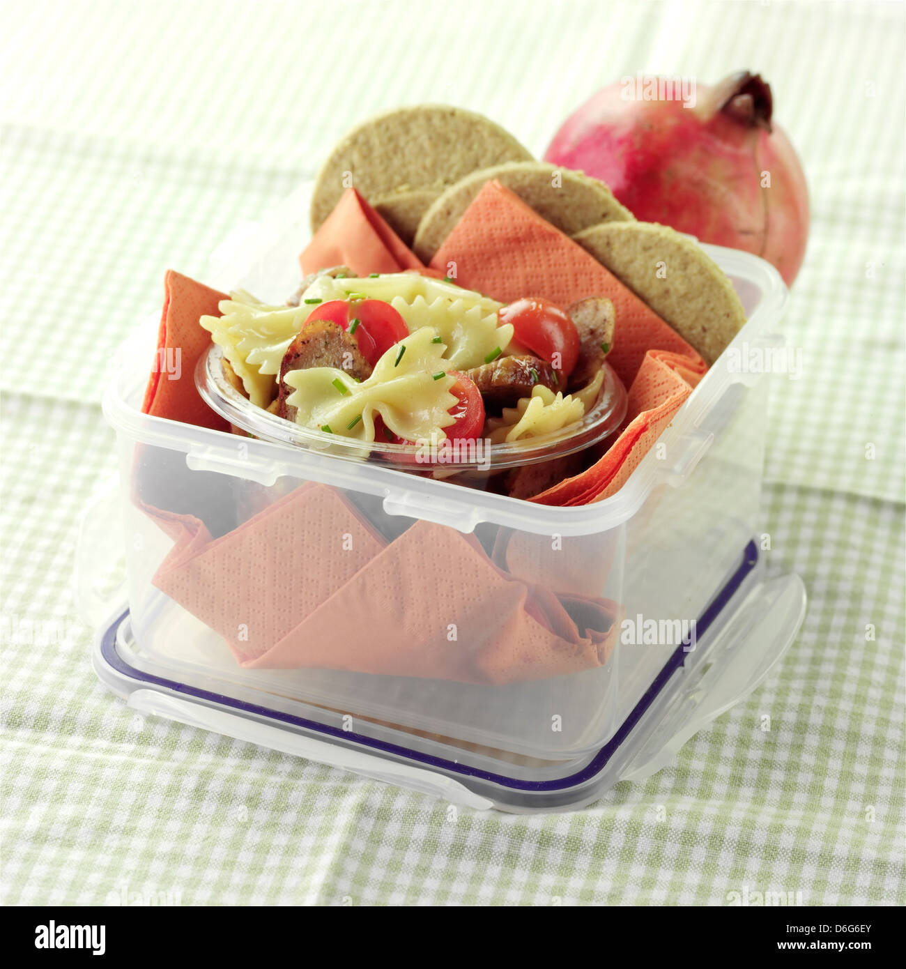 sausage and tomato pasta salad in a packed lunch Stock Photo - Alamy