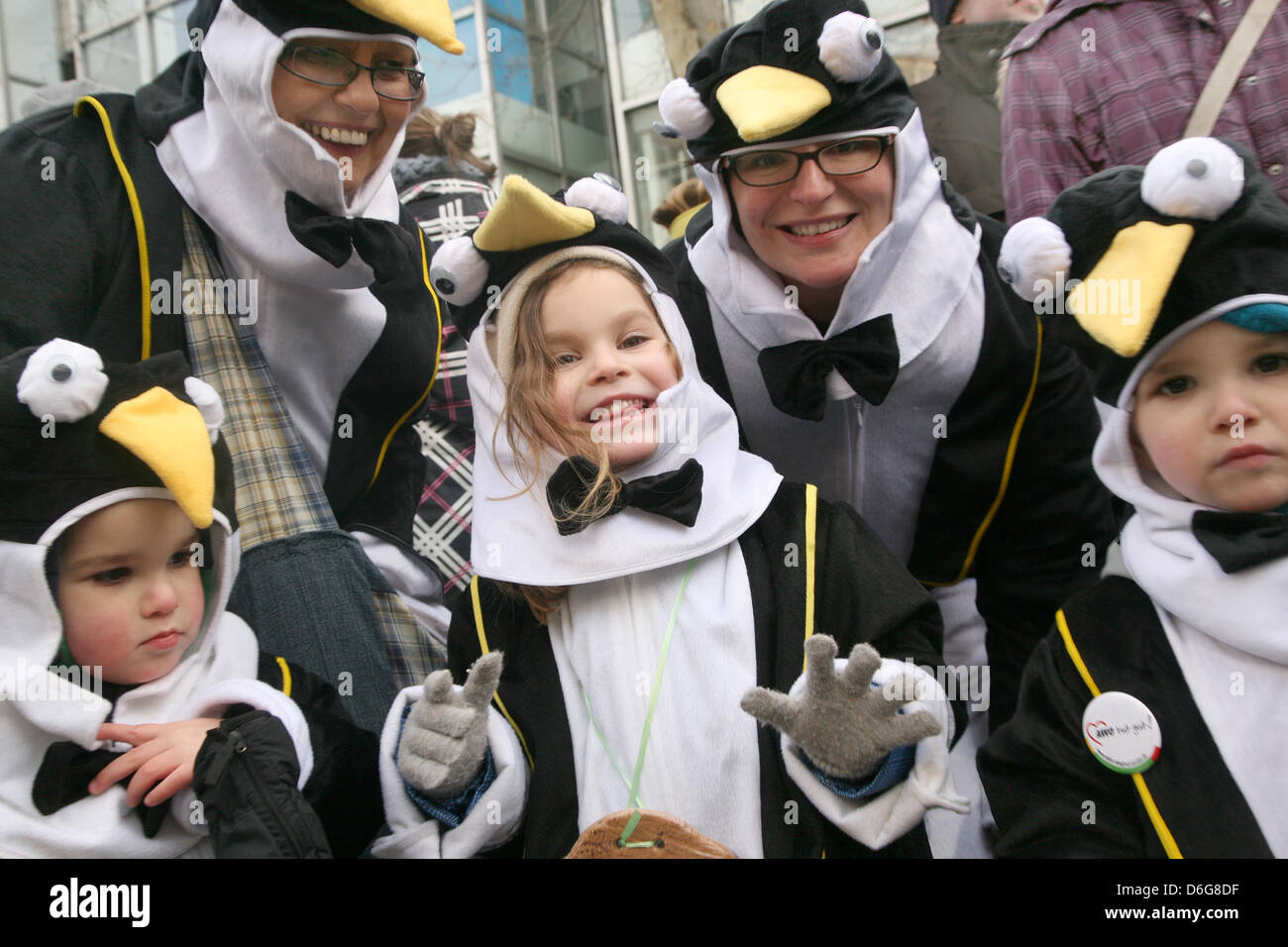 Several people dressed as penguins participate in the carnival in ...