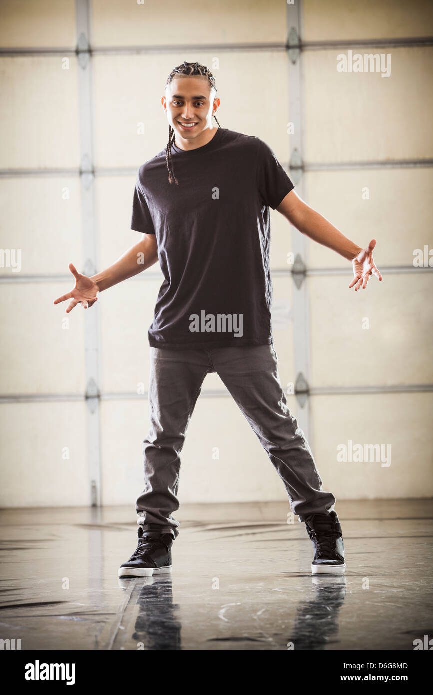 Hispanic man standing in studio Stock Photo - Alamy