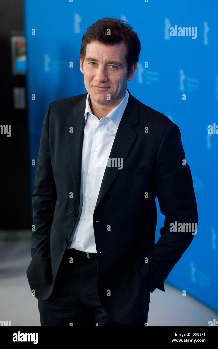 British actor Clive Owen poses at a photocall for the movie Shadow ...