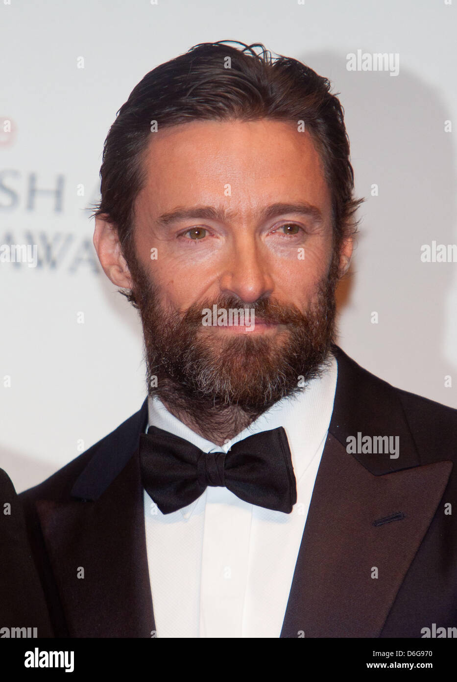 Actor Hugh Jackman poses in the Winner's Photo Room during the British ...