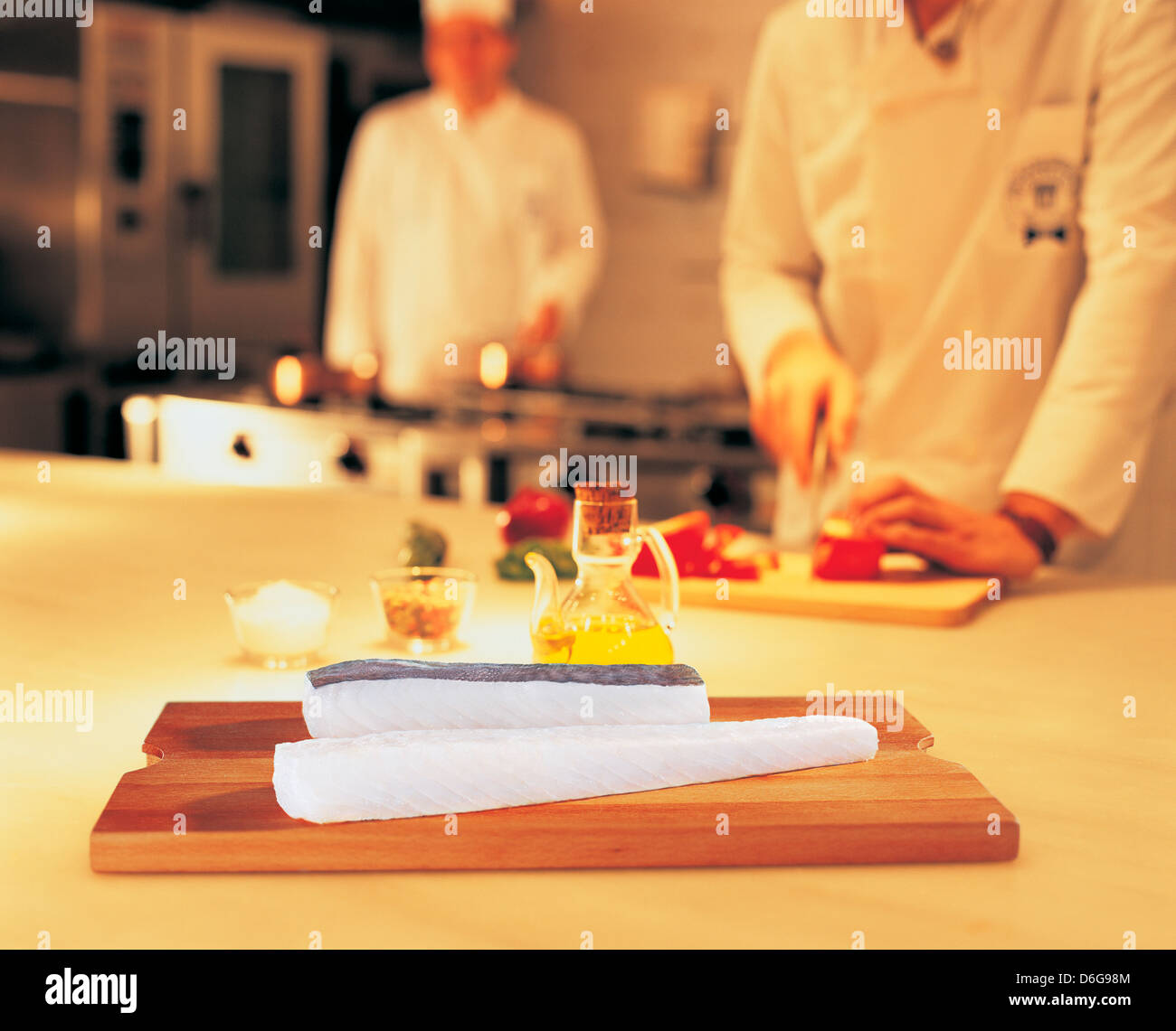 Chefs preparing fish Stock Photo - Alamy