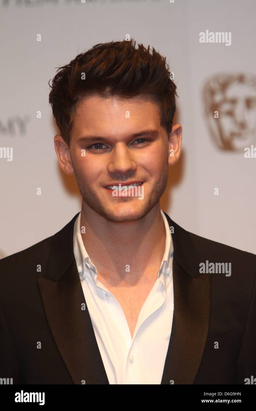 Actor Jeremy Irvine poses in the Winner's Photo Room during the British ...