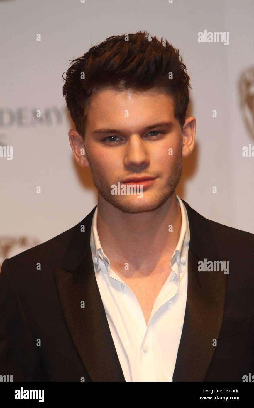Actor Jeremy Irvine poses in the Winner's Photo Room during the British ...