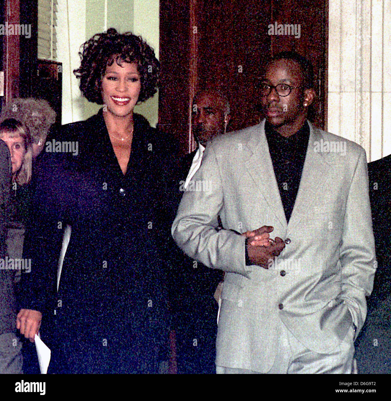 Whitney Houston and her husband, Bobby Brown arrive at a Capitol Hill ...