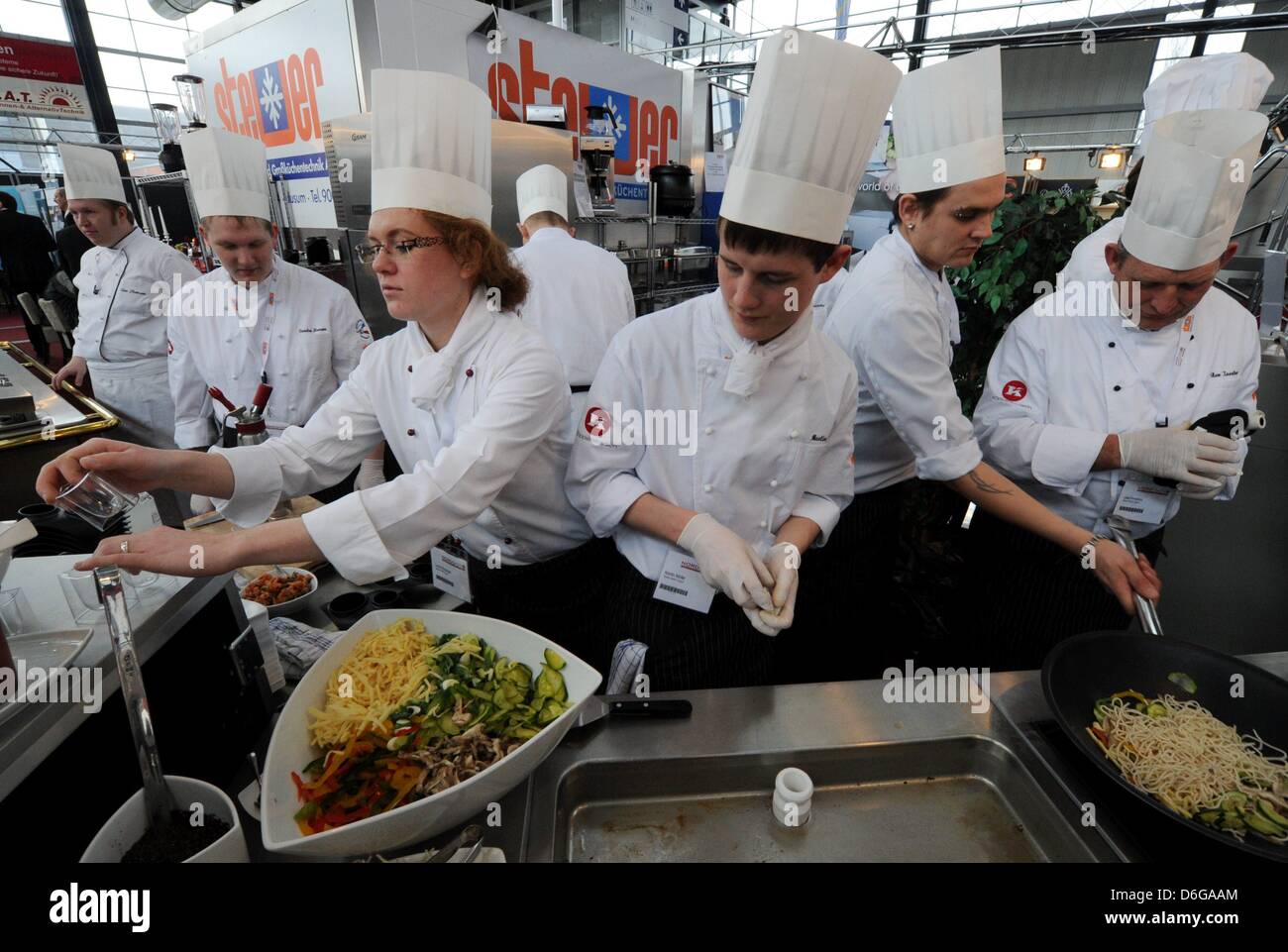 A group of young regional chefs prepare dishes at the Nord Gastro trade ...