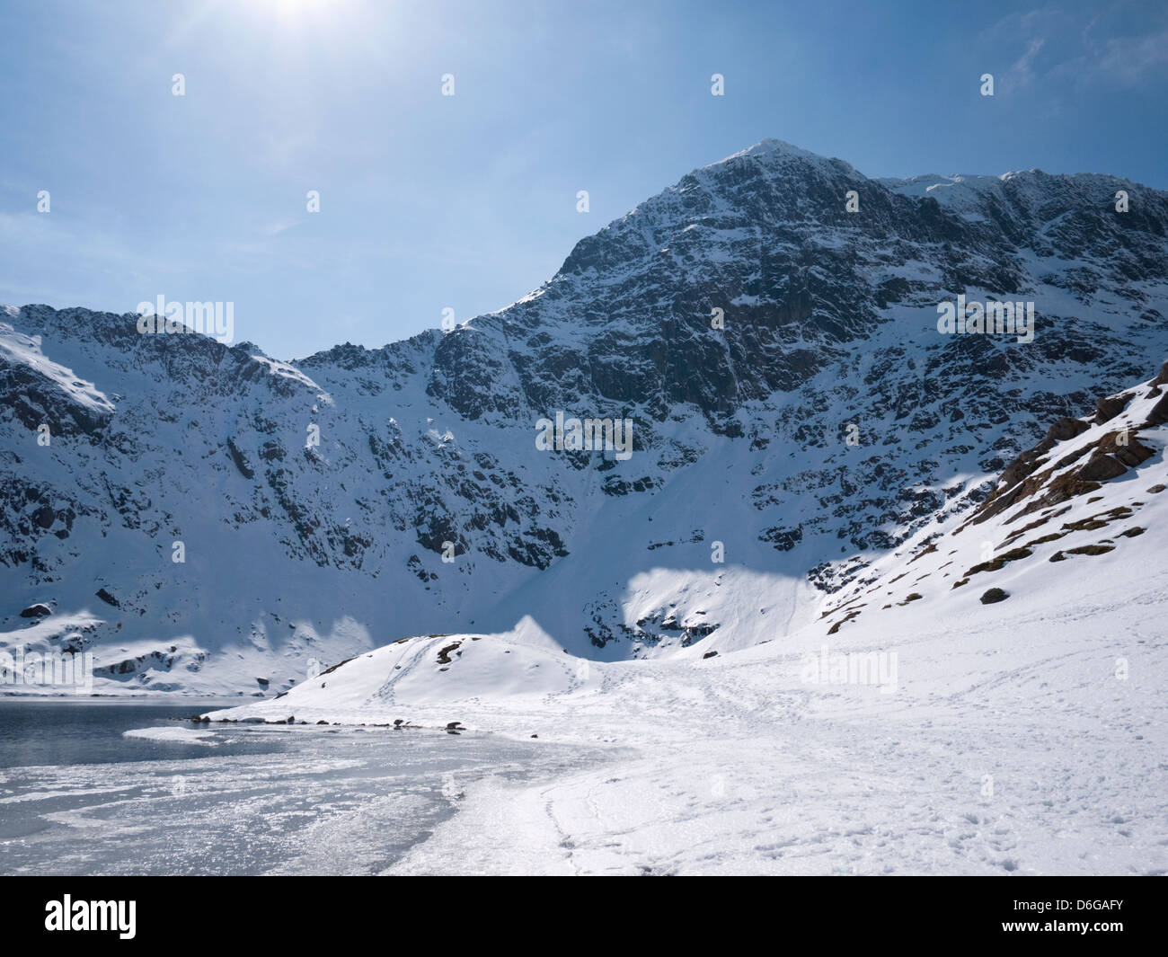 Snowdon in winter conditions - the summit, Yr Wyddfa, towering over ...