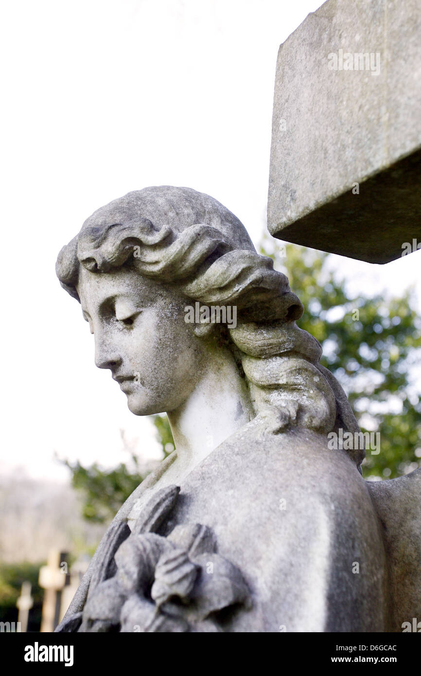 Stone carving of angel in graveyard hi-res stock photography and images ...